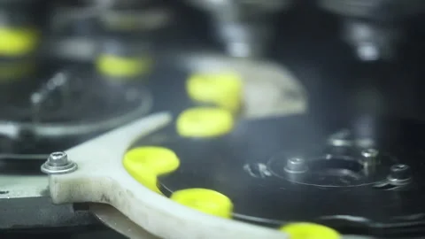 Close up of plastic bottle caps manufact... | Stock Video | Pond5