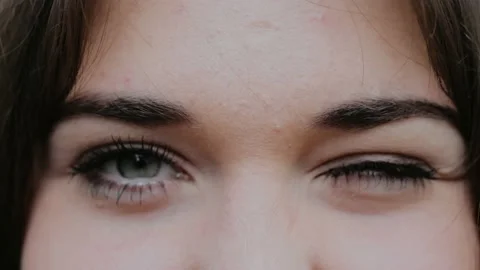 Woman Eye Winking Stock Video Footage | Royalty Free Woman Eye Winking ...