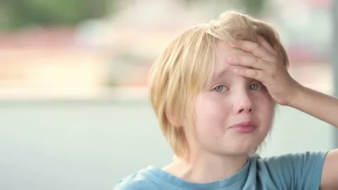 Close-up portrait of crying school-age c... | Stock Video | Pond5