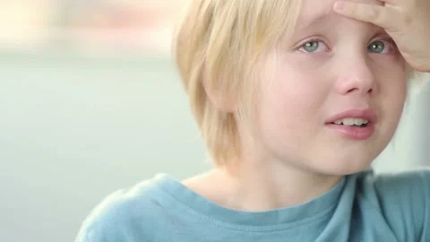 Close-up portrait of crying school-age c... | Stock Video | Pond5
