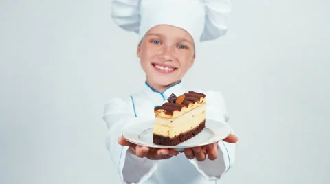 Close up portrait little chef cook holds... | Stock Video | Pond5