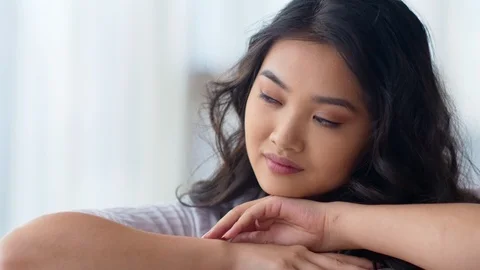 Close-up portrait modest dreaming smilin... | Stock Video | Pond5