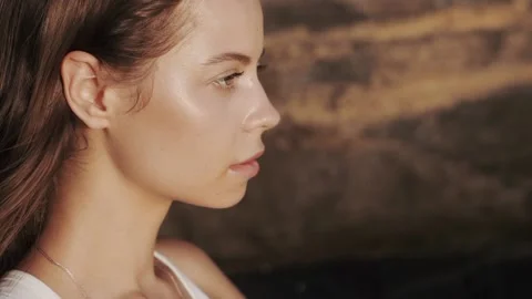 Close-up portrait, side view young and c... | Stock Video | Pond5