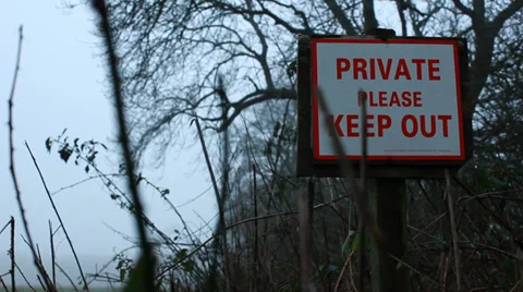 Close up - PRIVATE PLEASE KEEP OUT sign | Stock Video | Pond5