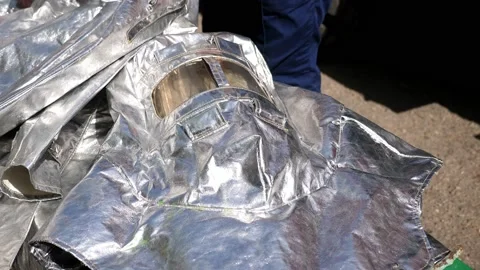Close-up of a protective fireproof suit ... | Stock Video | Pond5
