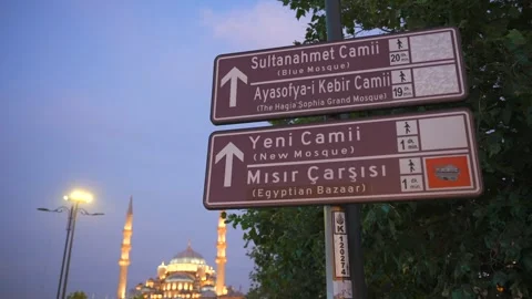Close up of road sign on the pillar indi... | Stock Video | Pond5