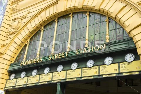 Close-up of the row of clocks above the main entrance of Flinders ...