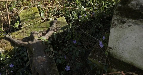 Close up ruined tombstone. a ruined tomb... | Stock Video | Pond5