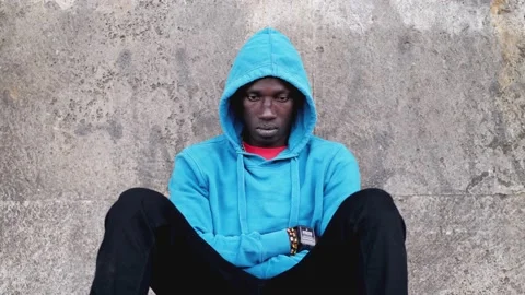 Close up on sad african migrant: despair... | Stock Video | Pond5