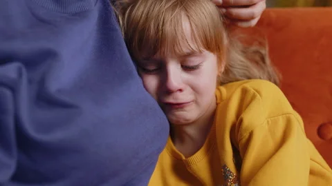 Close-up of sad girl kid is crying and l... | Stock Video | Pond5
