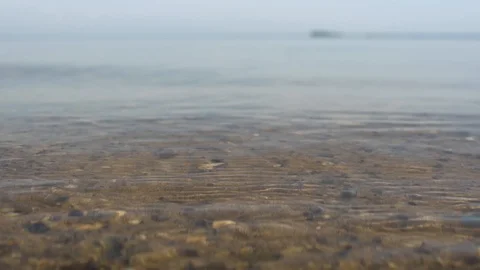 Close up sand with blurred sea sky backg... | Stock Video | Pond5