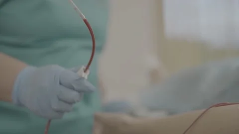 Close up of sanguin tube transfer 4k | Stock Video | Pond5