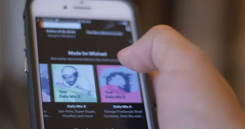 Close Up Scrolling through Playlists on ... | Stock Video | Pond5
