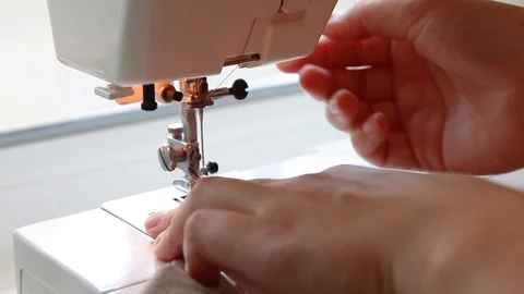 Close up on a sewing machine showing pro... | Stock Video | Pond5
