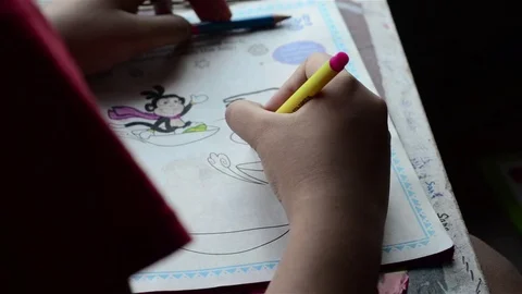 Close shot of a child drawing outline us... | Stock Video | Pond5