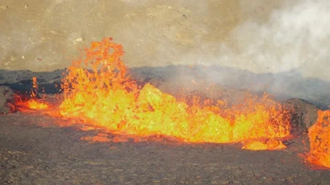 Close up shot of extremely hot lava bubb... | Stock Video | Pond5