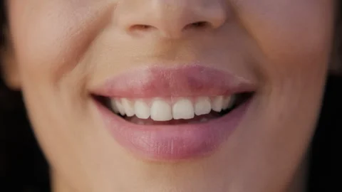 Close-up shot female lips sending air ki... | Stock Video | Pond5
