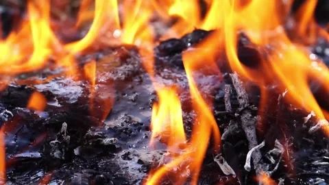 close up: Shot of fire flames on a black... | Stock Video | Pond5