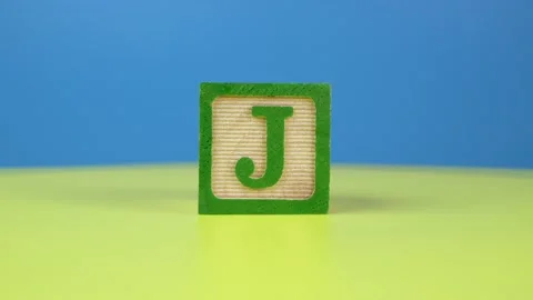 Close up shot letter "J" alphabet wooden... | Stock Video | Pond5