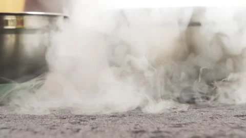 Close-up shot of liquid nitrogen vapor w... | Stock Video | Pond5