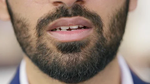Close shot of male mouth speaking to cam... | Stock Video | Pond5