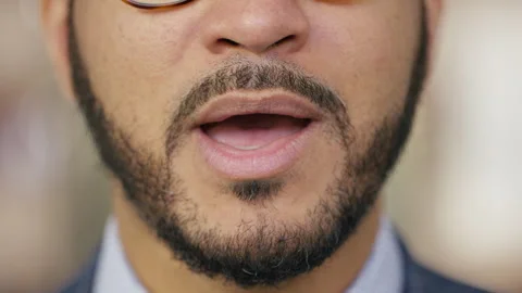Close up shot of male mouth talking to c... | Stock Video | Pond5