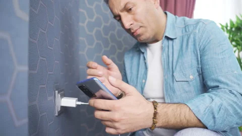 Close-up shot of man plugging electrical... | Stock Video | Pond5