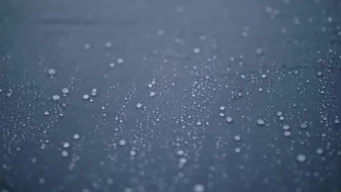 Close-up shot of raindrops water droplet... | Stock Video | Pond5