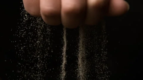 Sand Falling From Hand Stock Videos – Royalty-Free HD & 4K Videos
