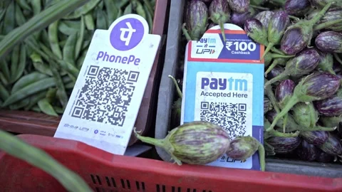 Close up shot of UPI QR codes scanners o... | Stock Video | Pond5
