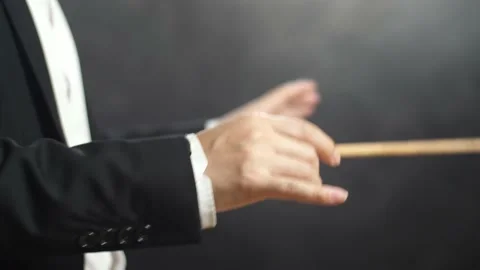 Close Up Side View Of Conductor'S Hands ... | Stock Video | Pond5