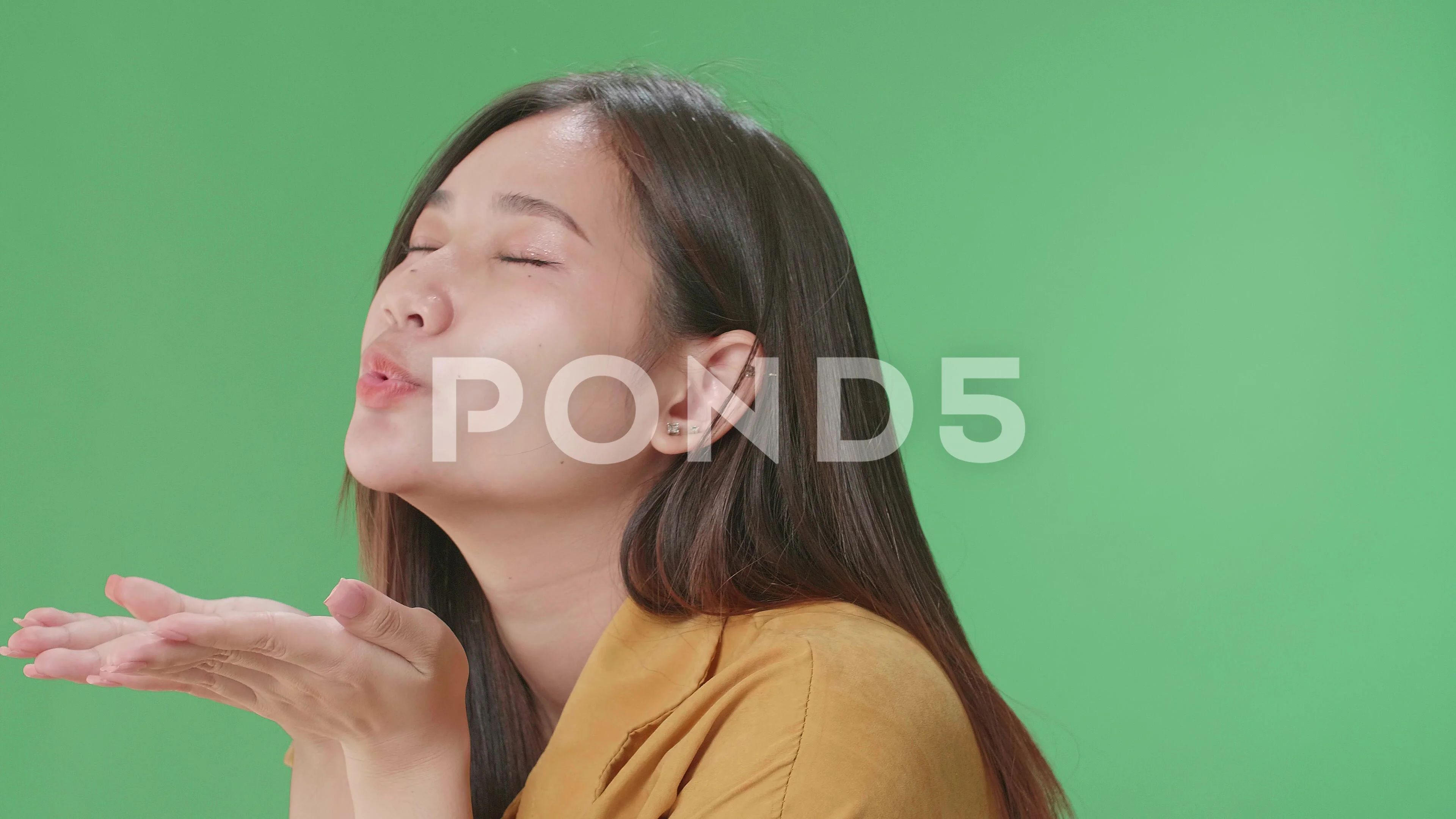 Girl Blowing A Kiss Side View