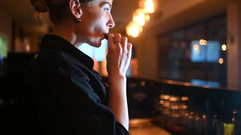 Close up side view of woman vaping and e... | Stock Video | Pond5