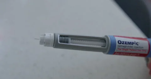 Close Up Slow Motion of an Ozempic Pen w... | Stock Video | Pond5