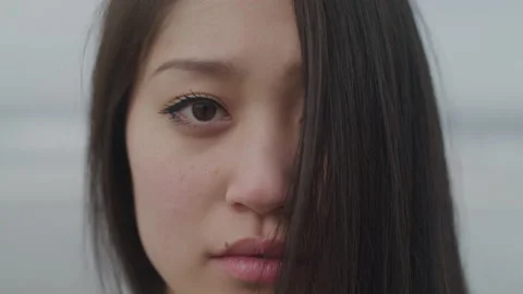 Close up slow motion shot of female asia... | Stock Video | Pond5