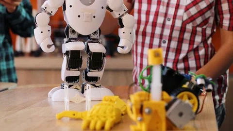 Close up of a small robot walking on the... | Stock Video | Pond5