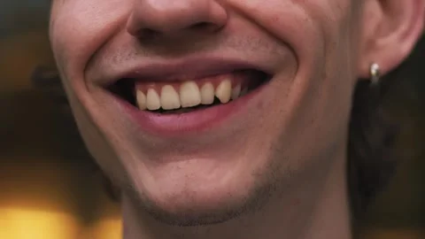 Close up of smiling teeth isolated. Deta... | Stock Video | Pond5