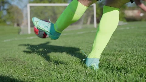 Close up of soccer ball being kicked by ... | Stock Video | Pond5