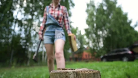 Close-up of splitting a wooden log. A wo... | Stock Video | Pond5