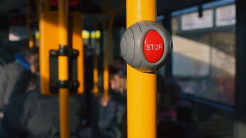 Close-up of a stop button on yellow publ... | Stock Video | Pond5