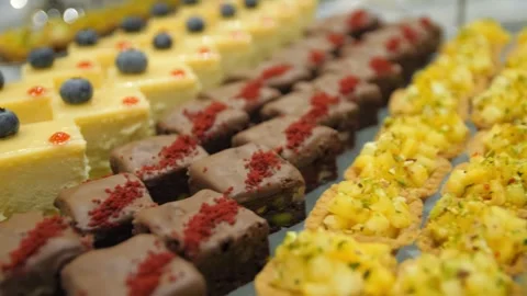 Close-up of sweet dishes on a buffet tab... | Stock Video | Pond5