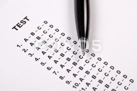 Close up of test score sheet with answers and pen Stock Photo #170618555