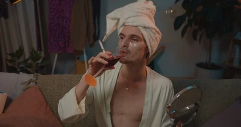 Close up of trans man in lounge wear sit... | Stock Video | Pond5