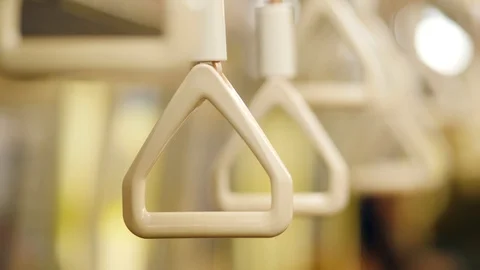 Close Up Of Triangle Train Handles Swayi... | Stock Video | Pond5