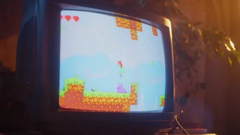 Close Up TV Screen with Arcade Game | Stock Video | Pond5