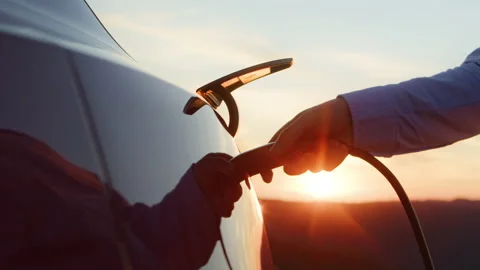 Close up unrecognizable man plugging in ... | Stock Video | Pond5