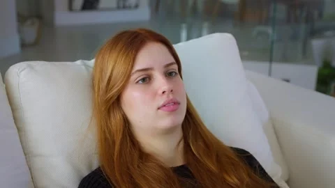 Close-up video of pretty girl sitting on... | Stock Video | Pond5