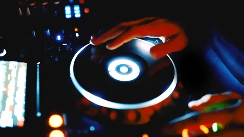 Close up view of DJ's hand controls on t... | Stock Video | Pond5