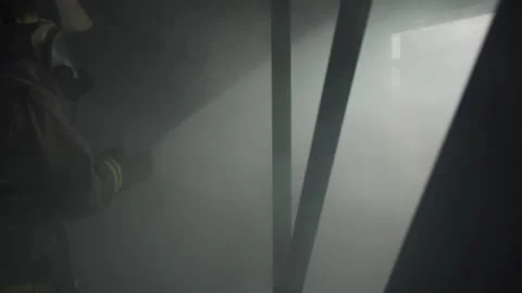 Close up view of fireman inside burning ... | Stock Video | Pond5
