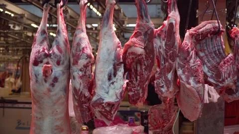 Close-up view of hanging beef in a marke... | Stock Video | Pond5